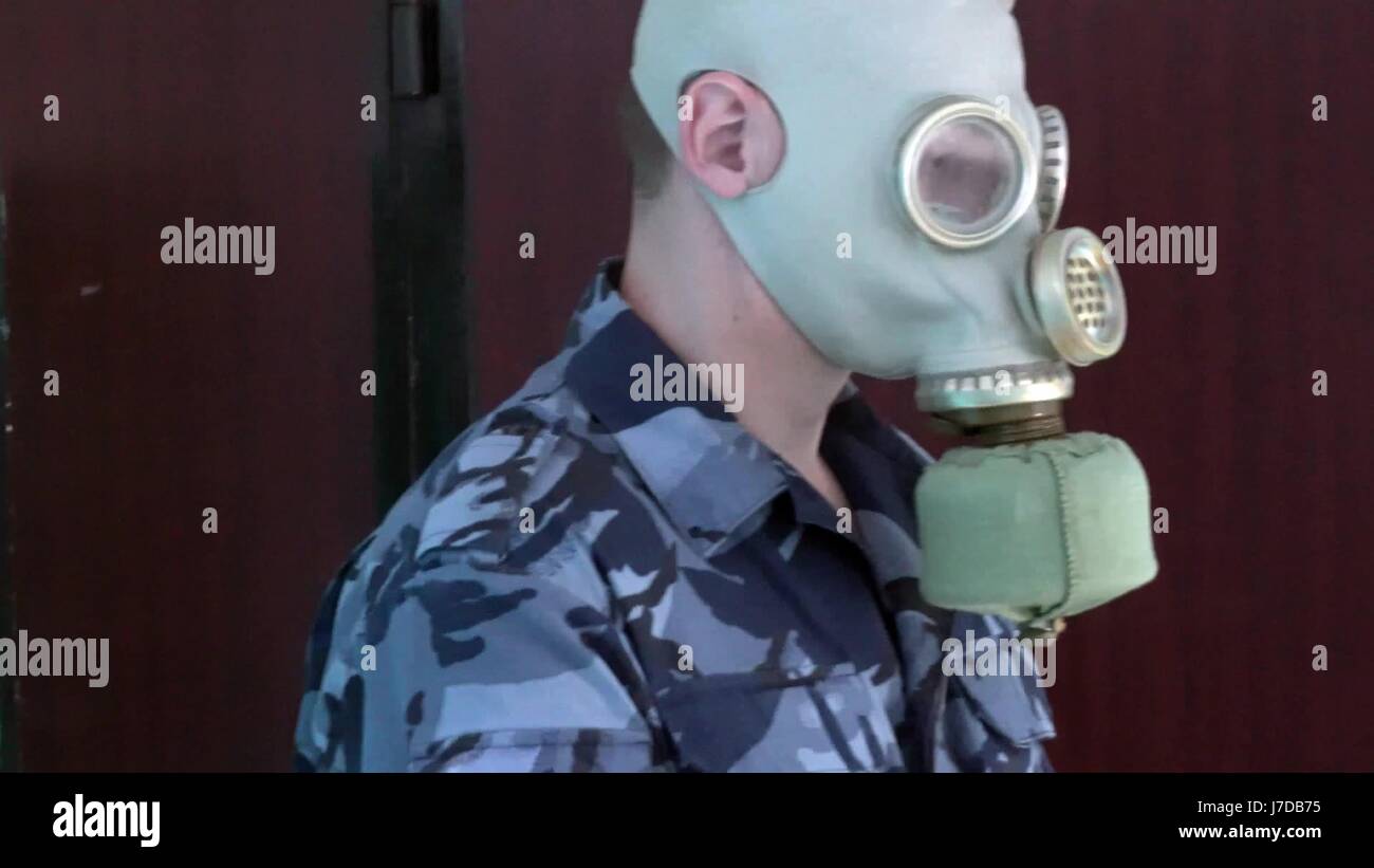 The guard, dressed in military uniform in the mask does not pass the ...