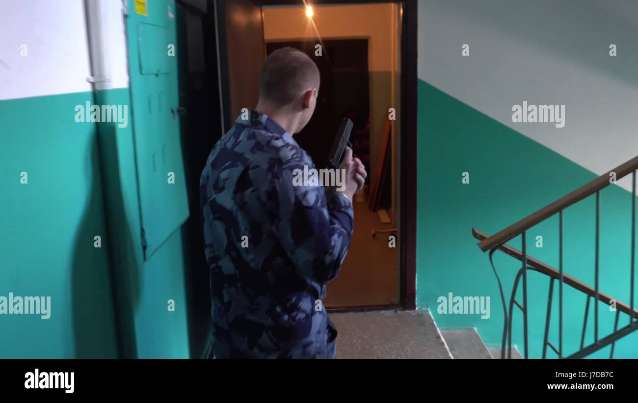 Guard dressed in military uniform the storming of the building Stock ...