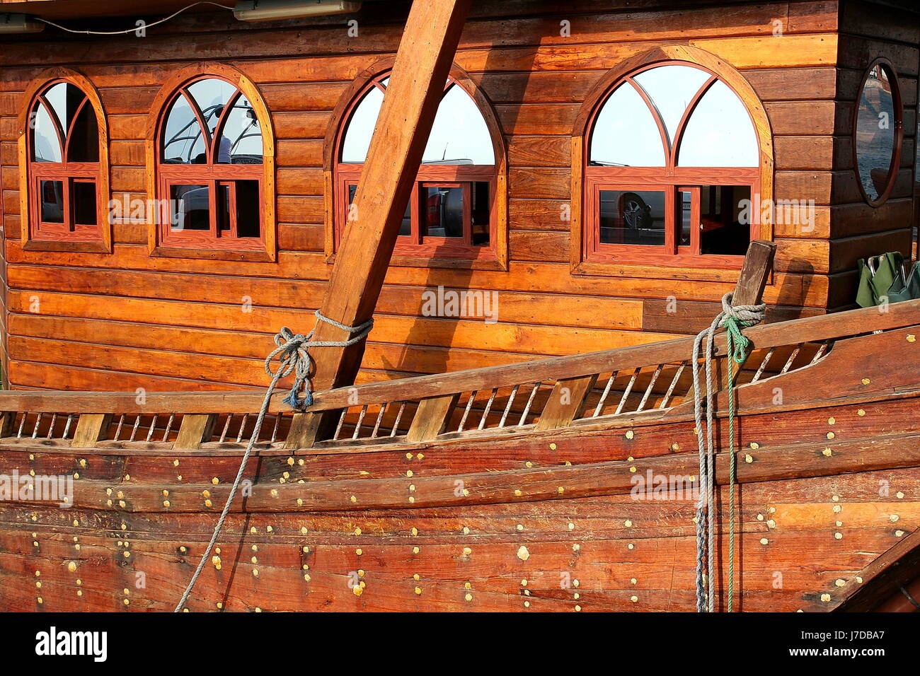 A dhow in the harbour of Doha, Qatar, showing its wooden construction ...