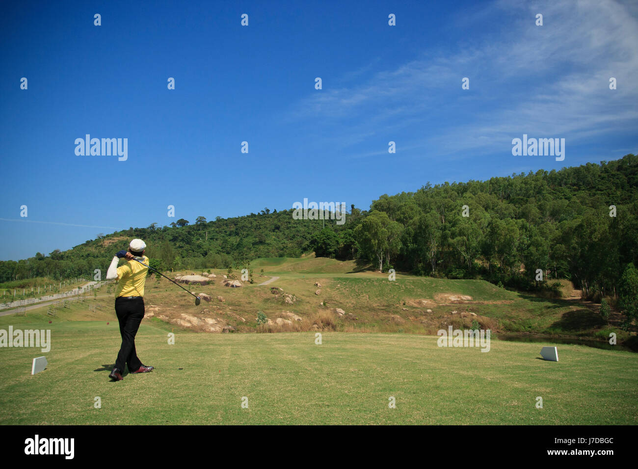 man driving golf on sport club Stock Photo - Alamy
