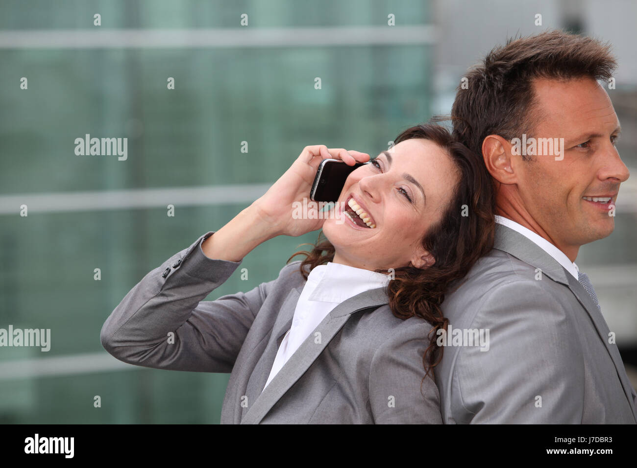 woman conversation telephone phone bank lending institution laugh ...