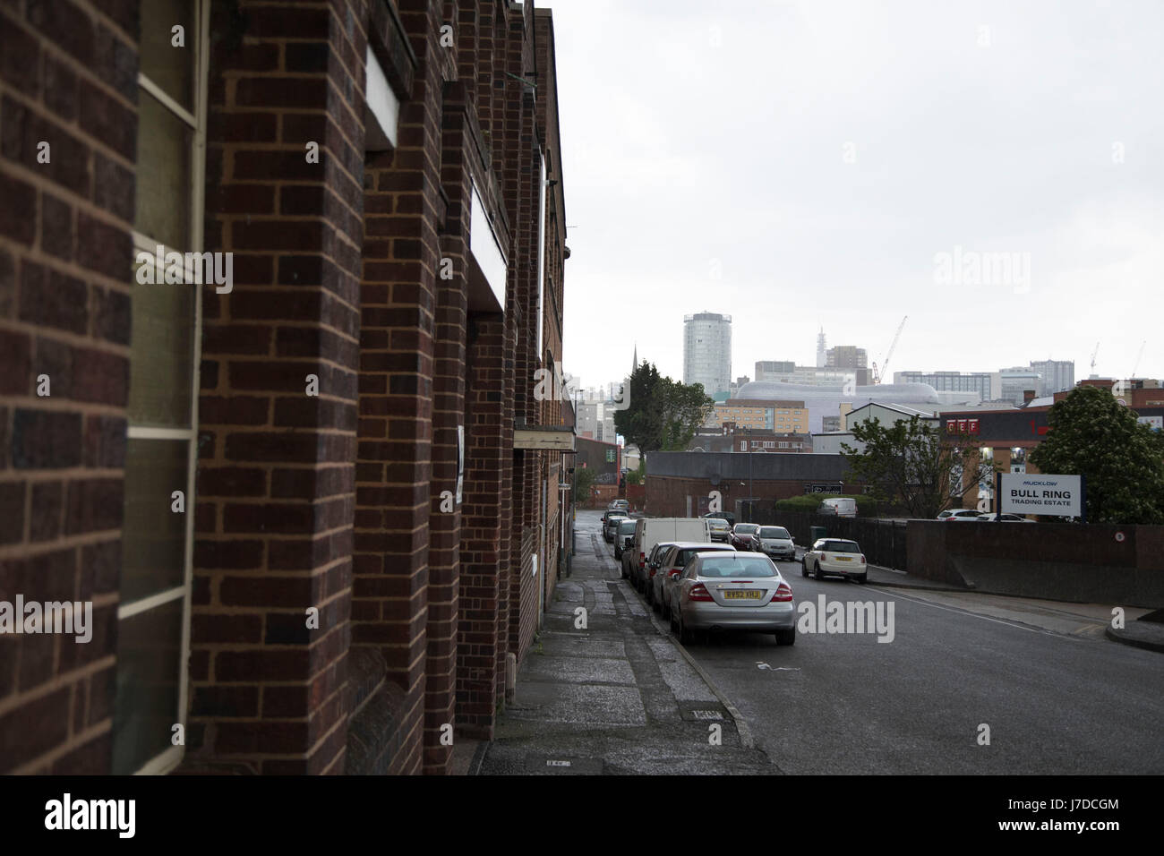 Storm clouds build over old red brick industrial buildings at Digbeth ...