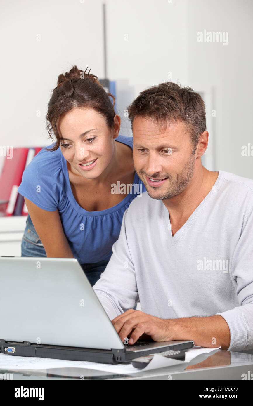 woman office laptop notebook computers computer laugh laughs laughing ...