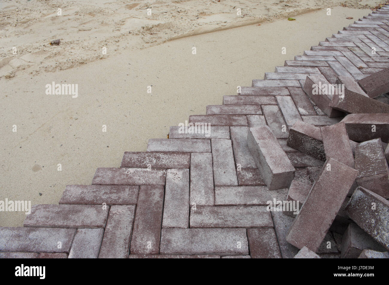 Interlocking square bricks hi-res stock photography and images - Alamy