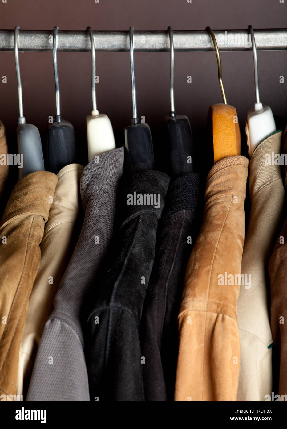 closeup hanger clothes clothing rack hanging hang up closet wardrobe ...