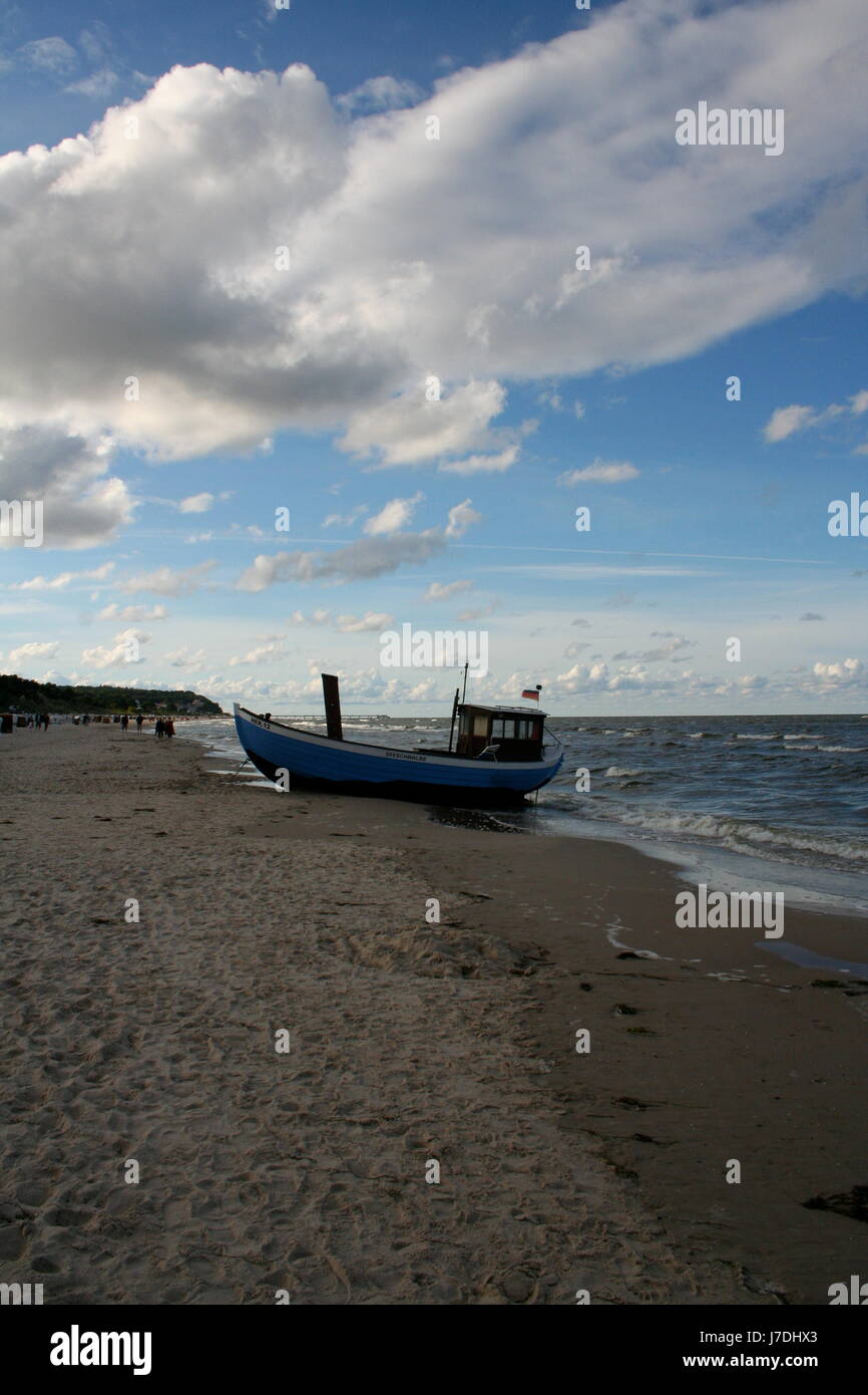 stranded boat on the beach Stock Photo - Alamy