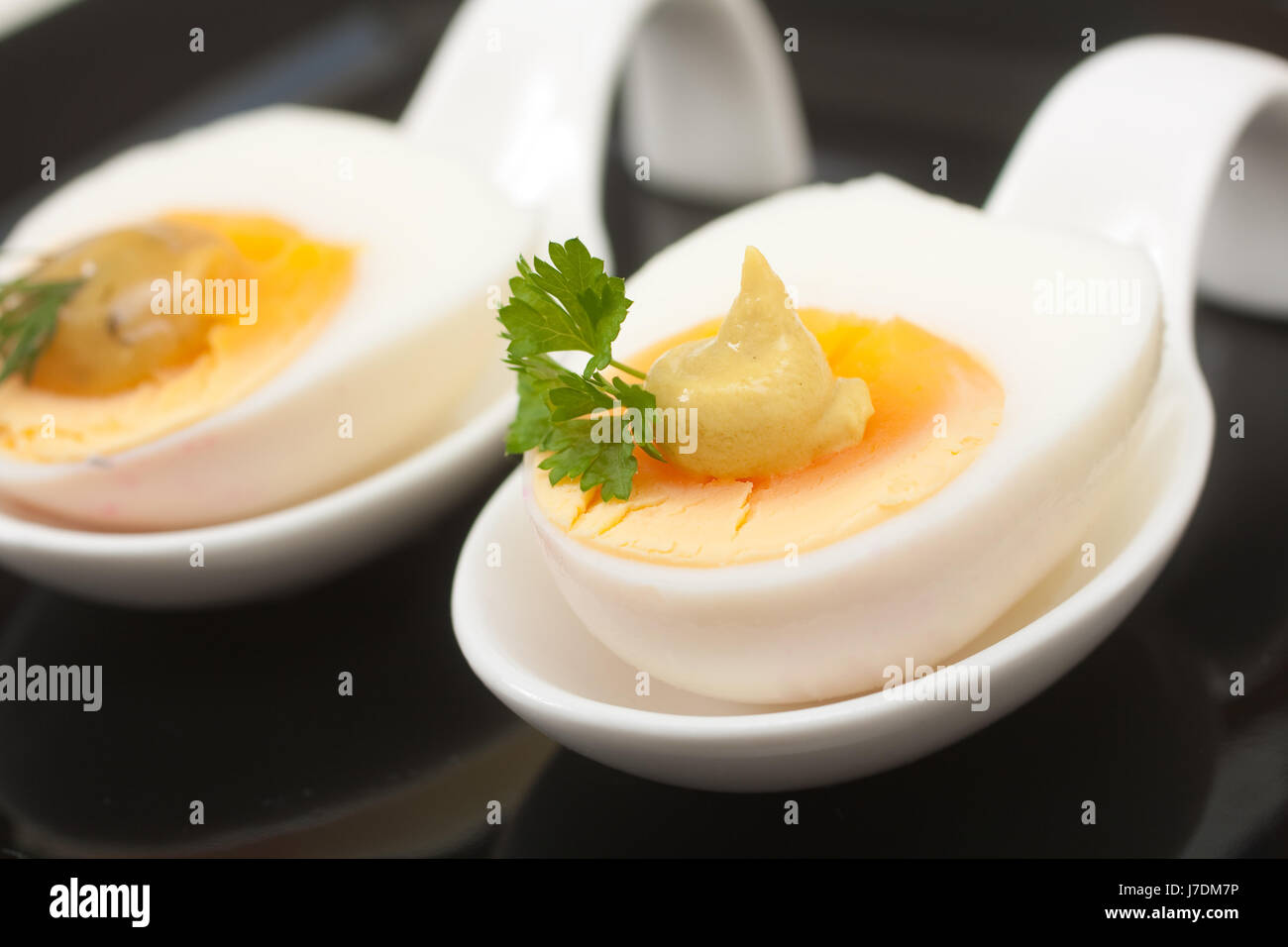 appetizer - garnished eggs Stock Photo - Alamy
