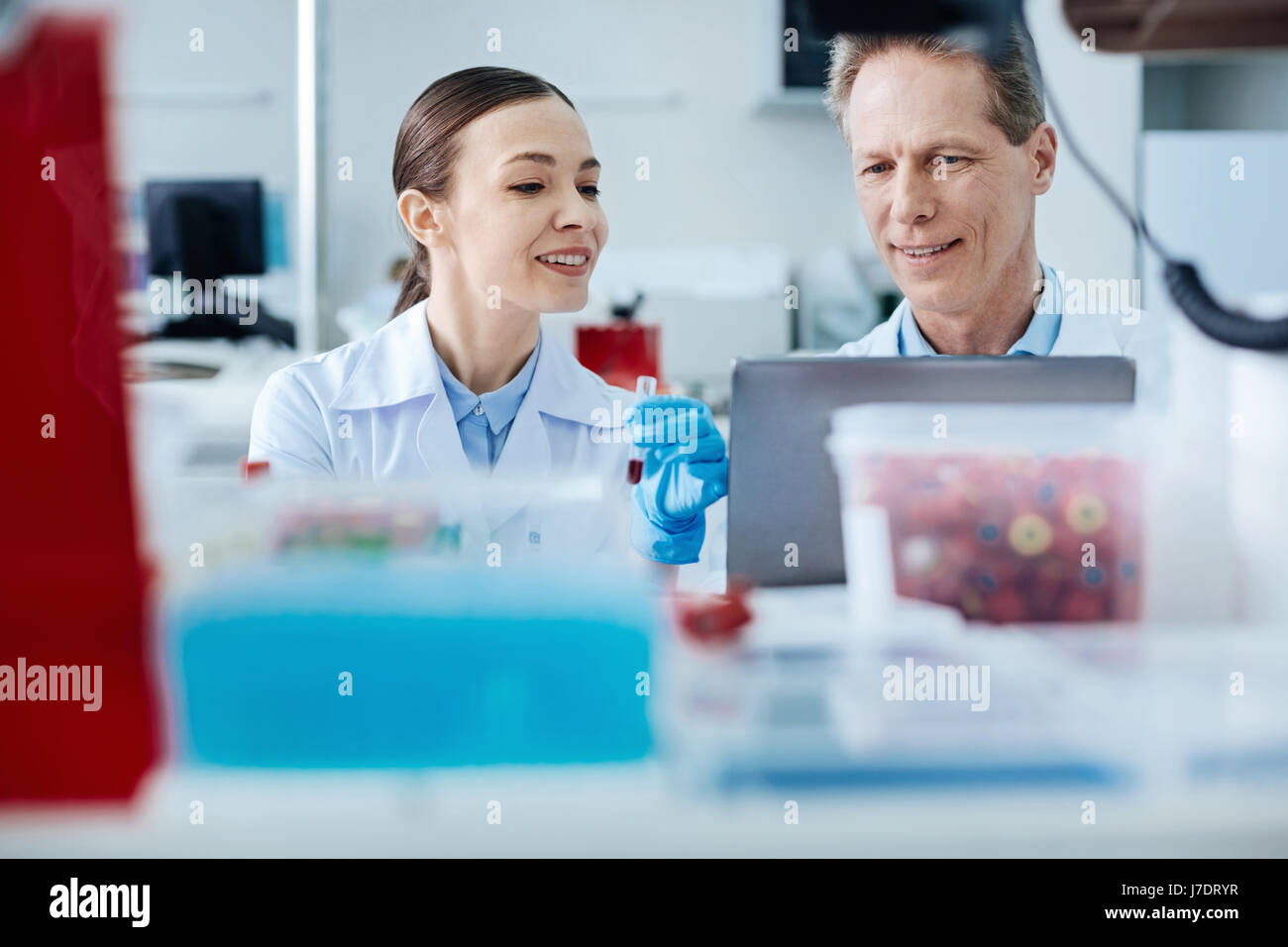 Horizontal photo of two technicians while working together Stock Photo ...