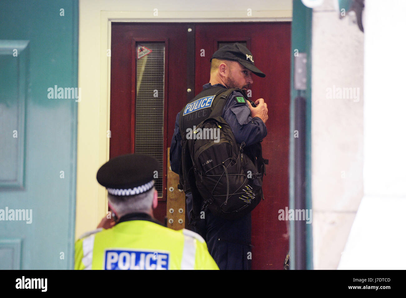 Police from the Tactical Aid Unit enter Granby House in Granby Row ...