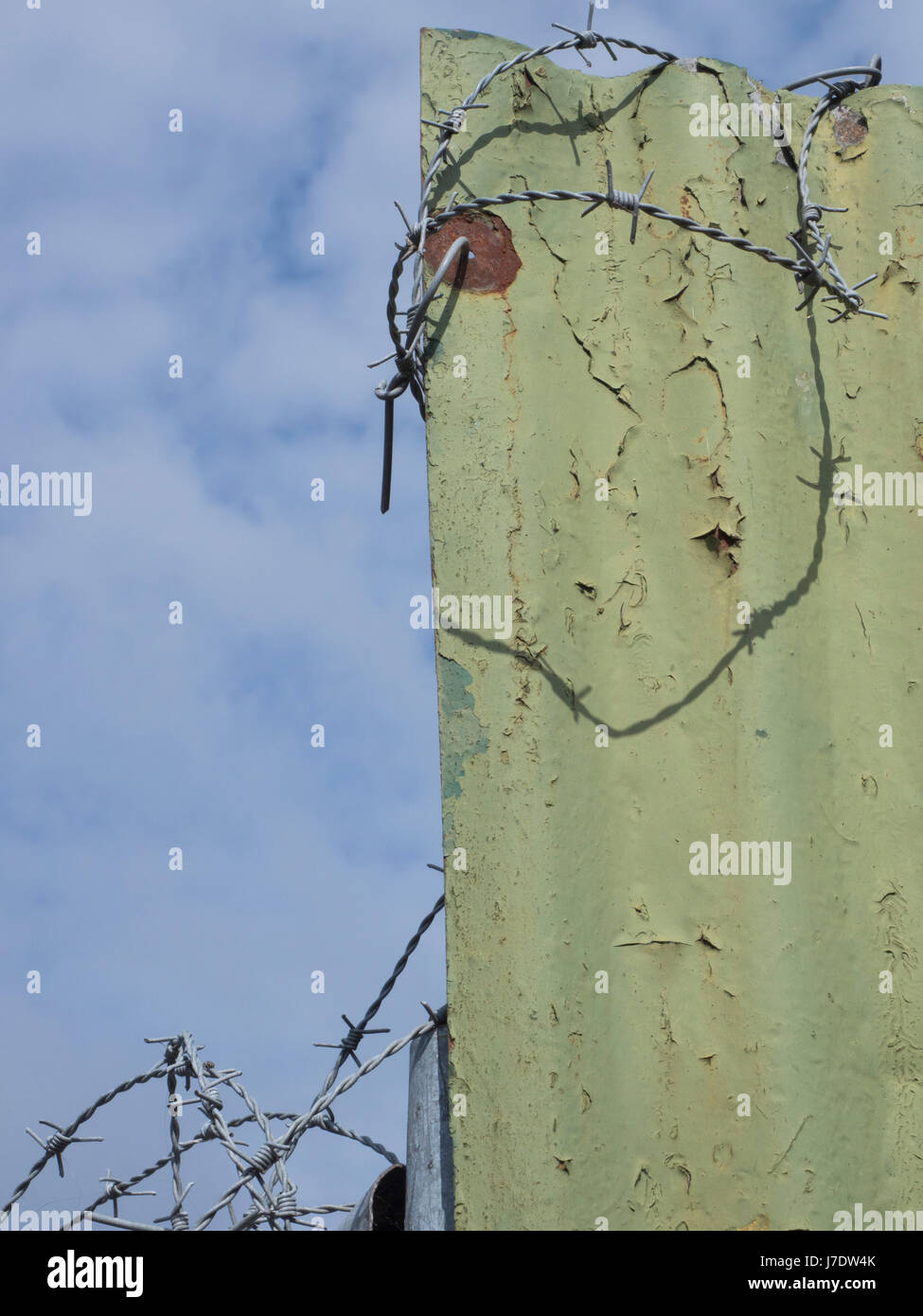 Barbed wire barrier Stock Photo - Alamy