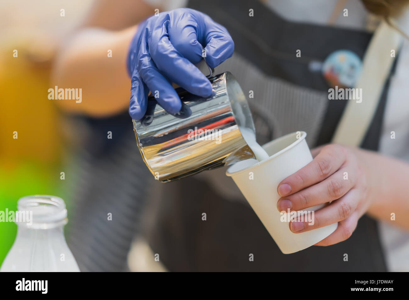 Close-up of barista hands, preparing proper cappuccino pouring Milk ...