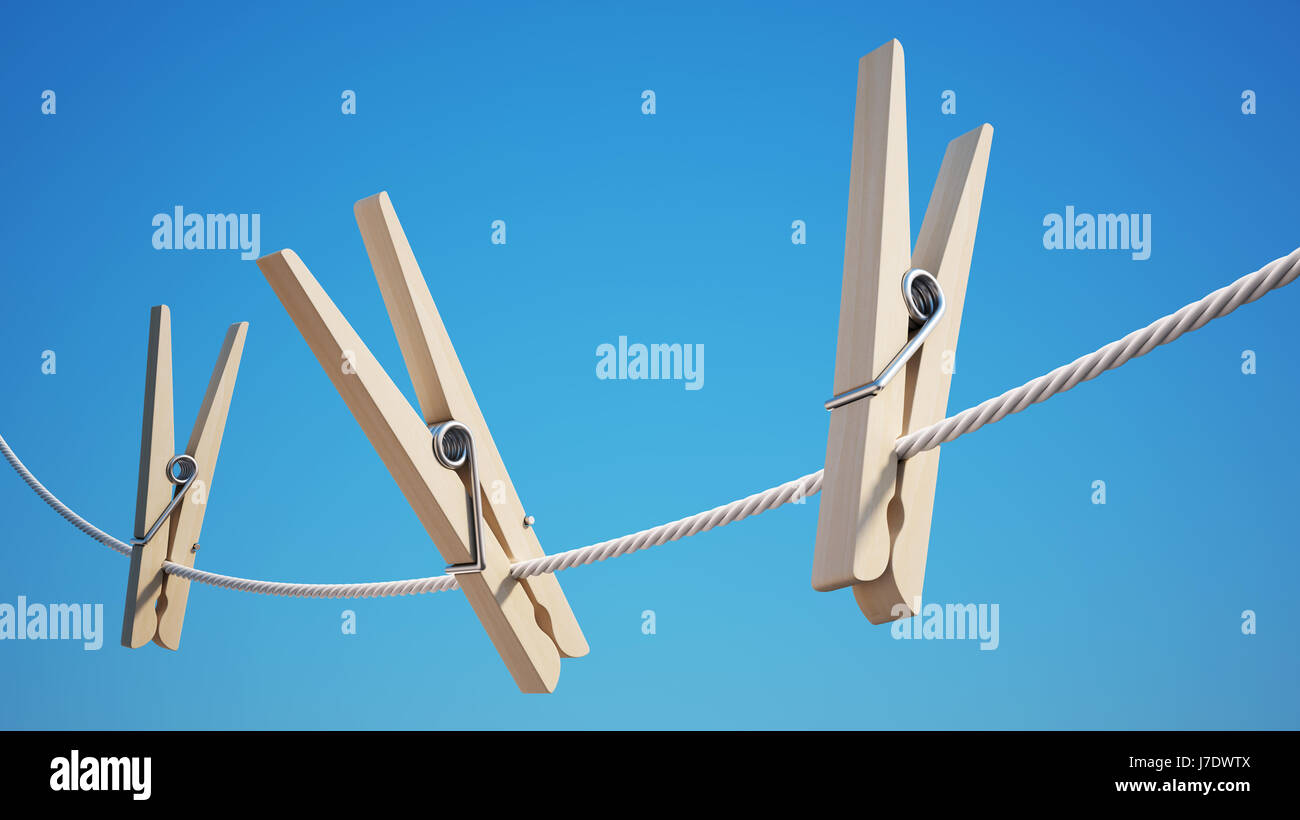 Clothespins with Clipping Path isolated on sky Stock Photo - Alamy