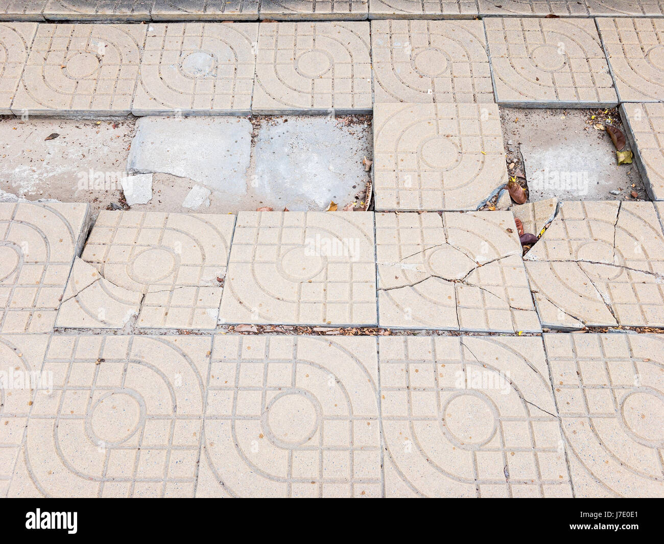 Broken floor tiles with the rain drop of the park pavement in the ...