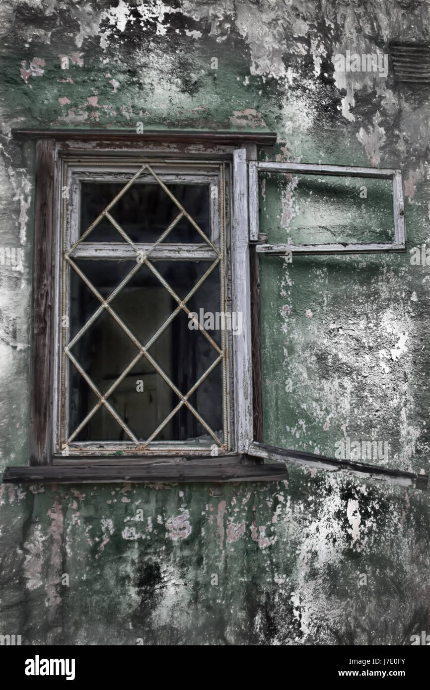window in abandoned house broken. building where there are no people ...