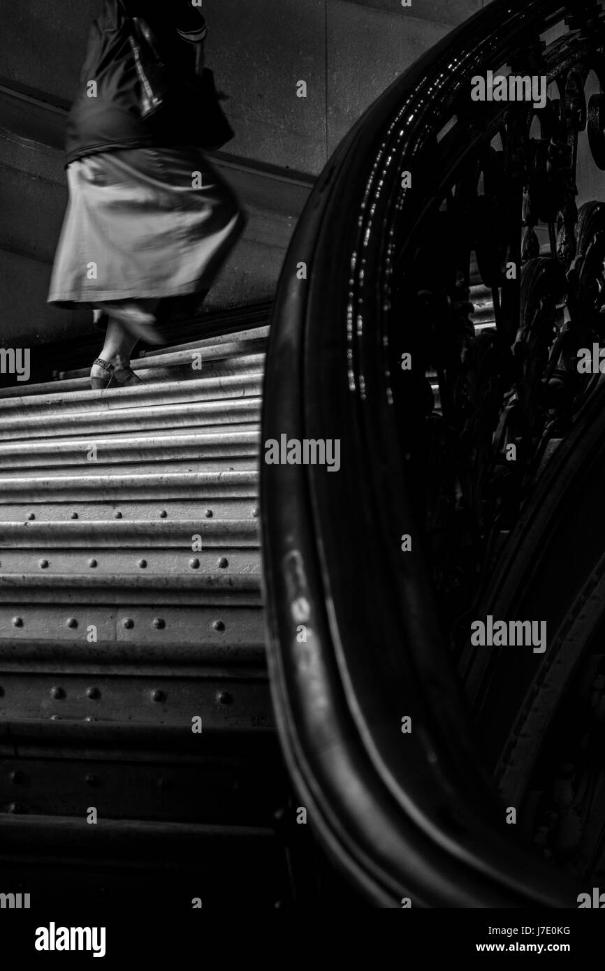 Lady climbing stairs hi-res stock photography and images - Alamy