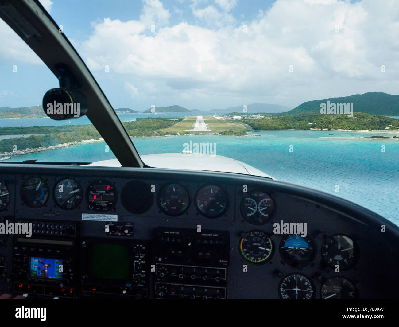 small prop airplane approaches the dangerous short runway at the ...