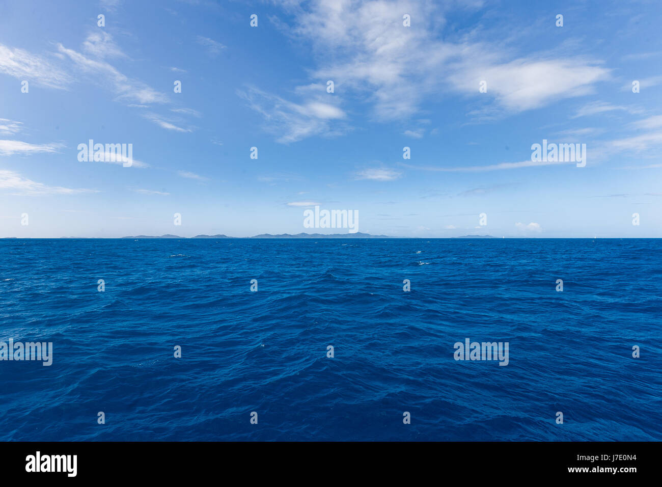 beautiful blue ocean horizon and clouds Stock Photo - Alamy