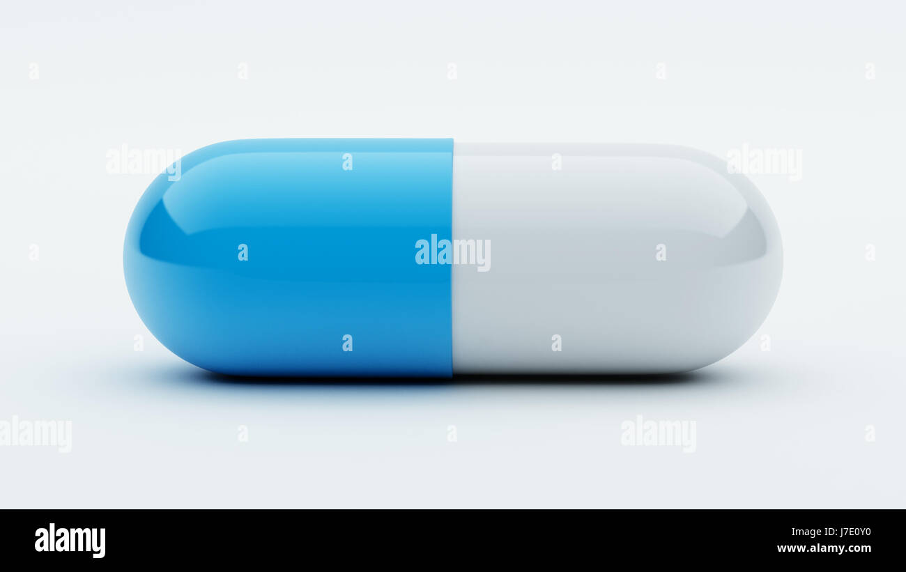 Pill on a white background Stock Photo - Alamy