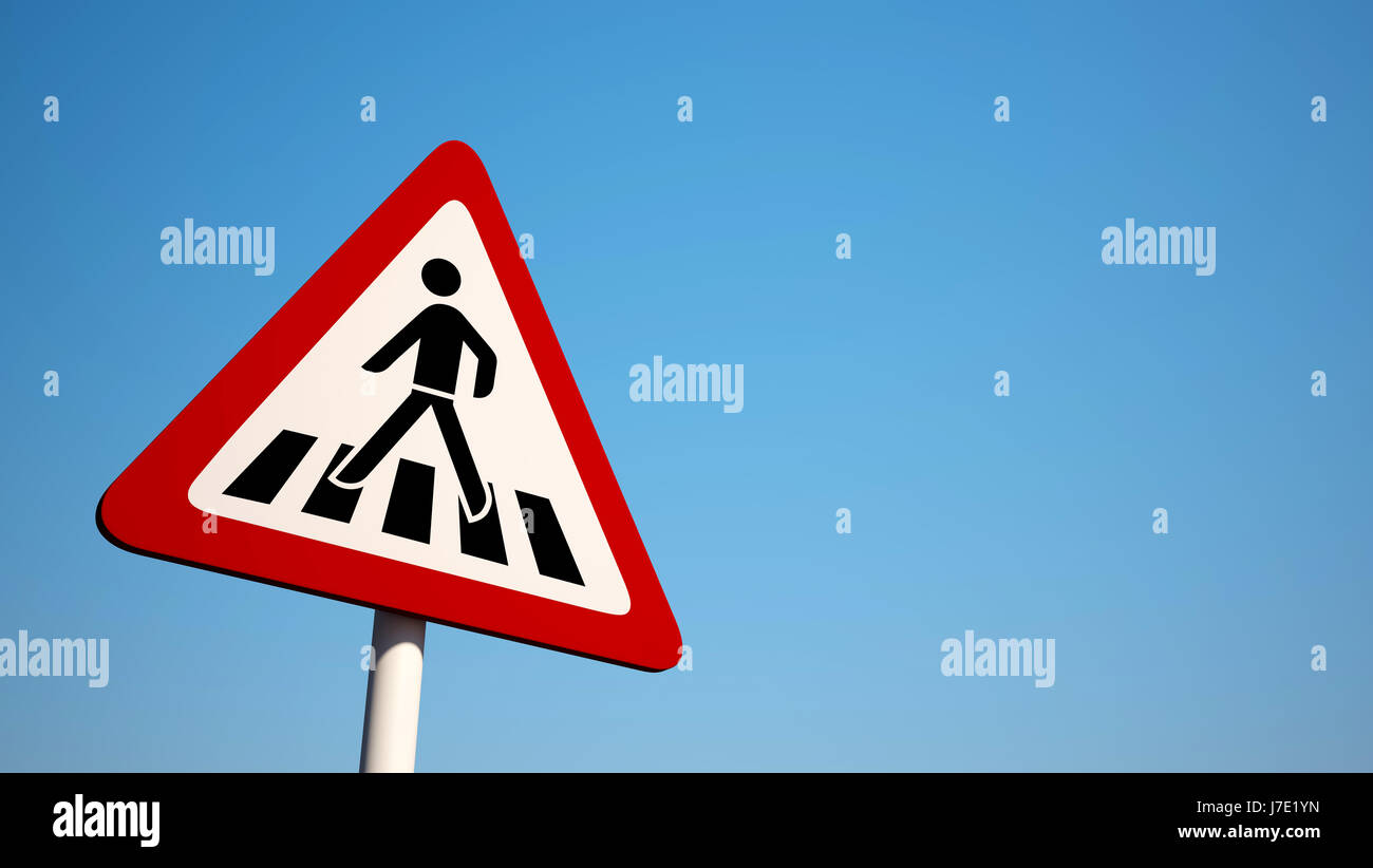 Crossing Sign isolated on clean blue sky Stock Photo - Alamy