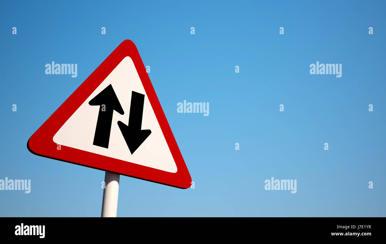 Two Way Sign isolated on clean blue sky Stock Photo - Alamy
