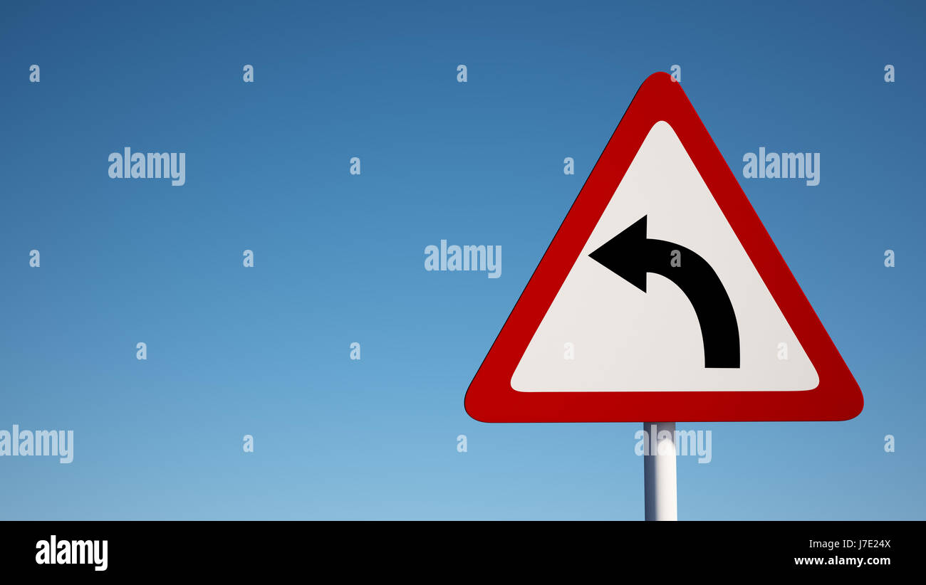 Curve Sign isolated on clean blue sky Stock Photo - Alamy