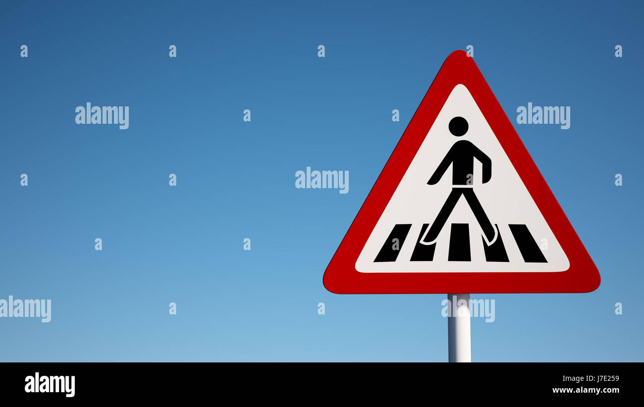 Crossing Sign isolated on clean blue sky Stock Photo - Alamy