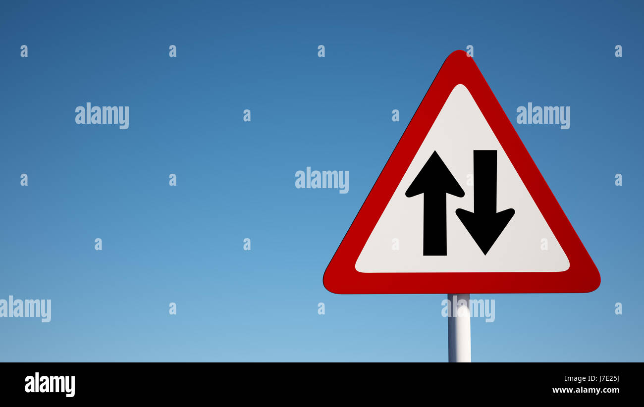 Two Way Sign isolated on clean blue sky Stock Photo - Alamy