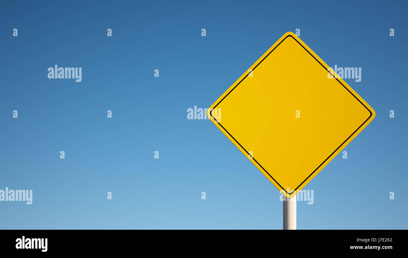 Yellow Blank Sign isolated on clean blue sky Stock Photo - Alamy