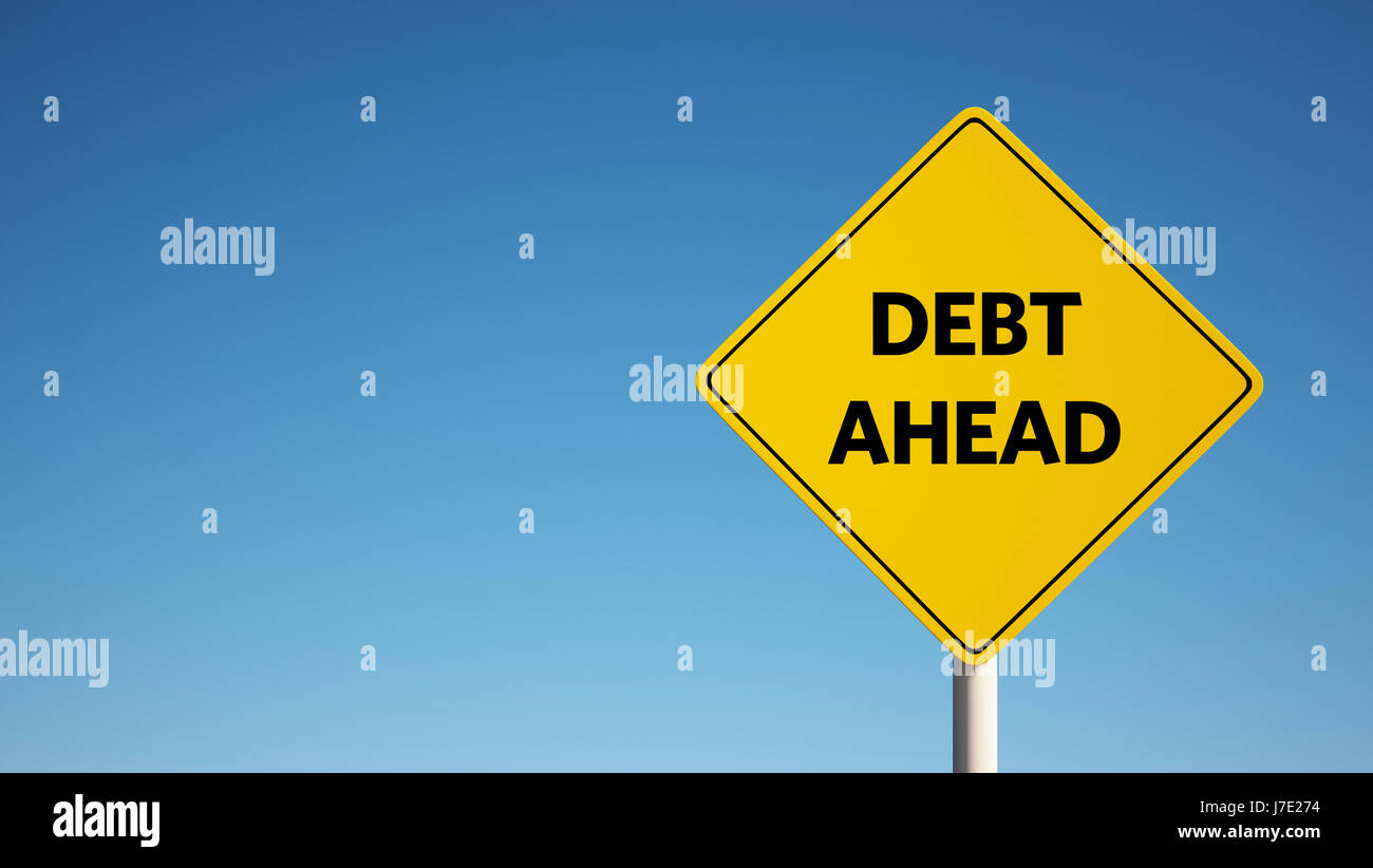 Debt Sign isolated on clean blue sky Stock Photo - Alamy