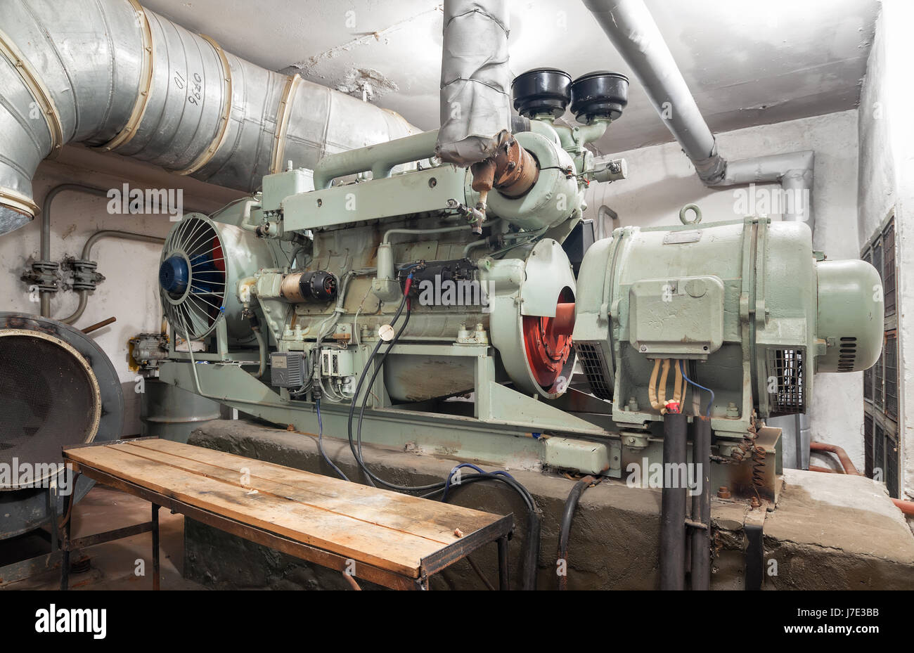 Big diesel generator inside an bomb shelter Stock Photo - Alamy
