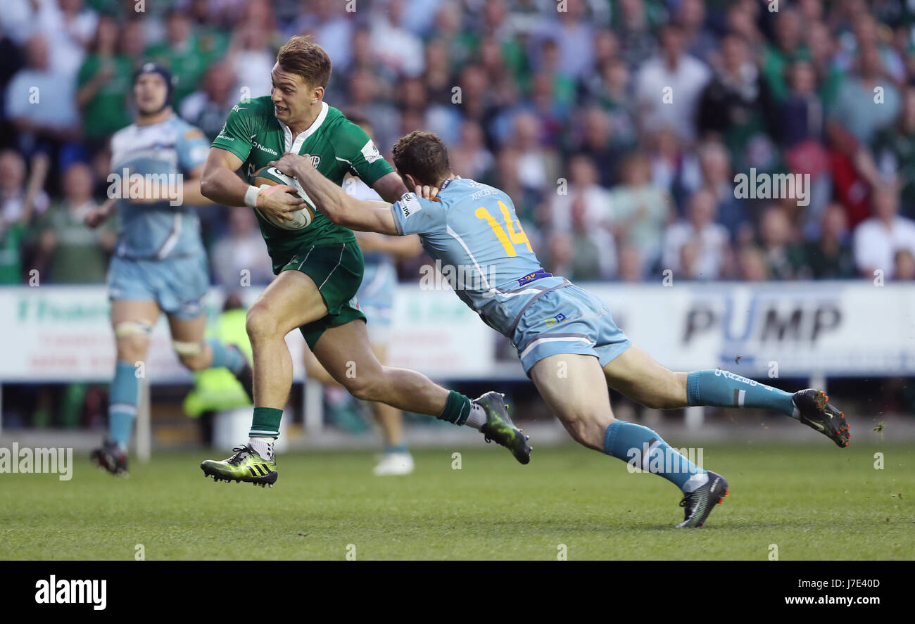 London Irish's Alex Levington beats the tackle of Yorkshire Carnegie's ...