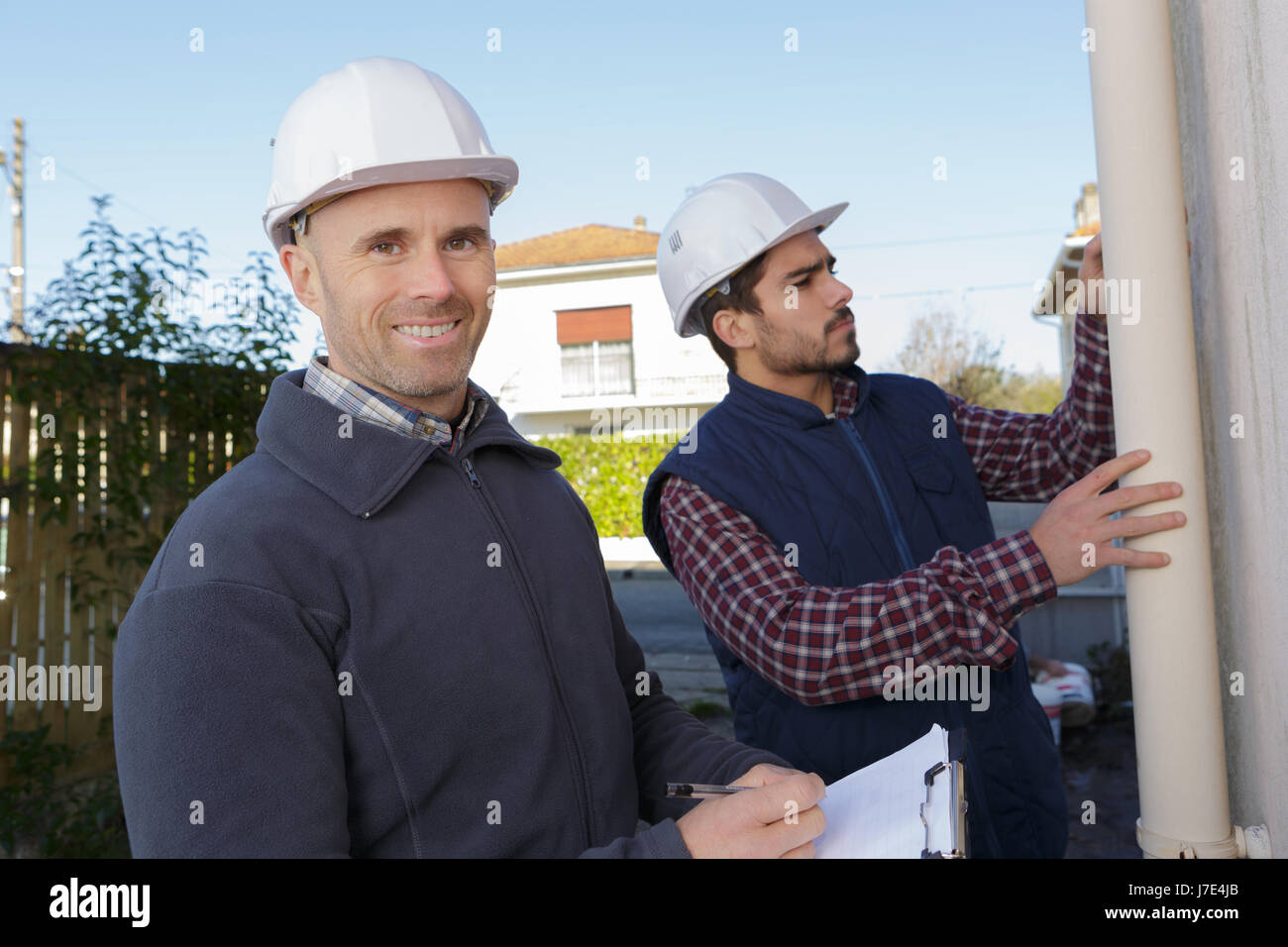 engineers outside a small construction site Stock Photo - Alamy
