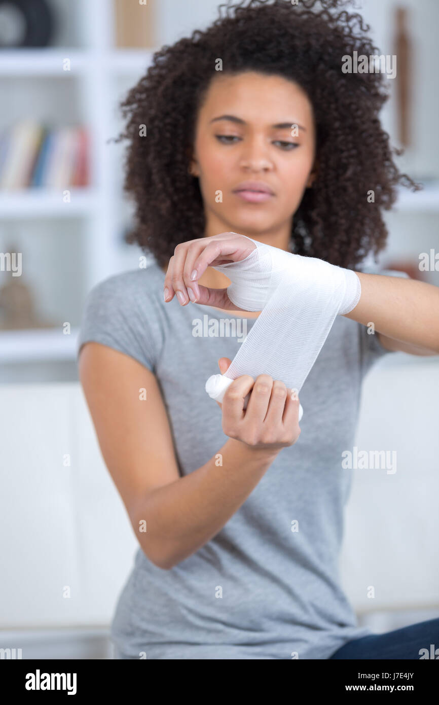 woman is wrapping hands with bandage Stock Photo - Alamy