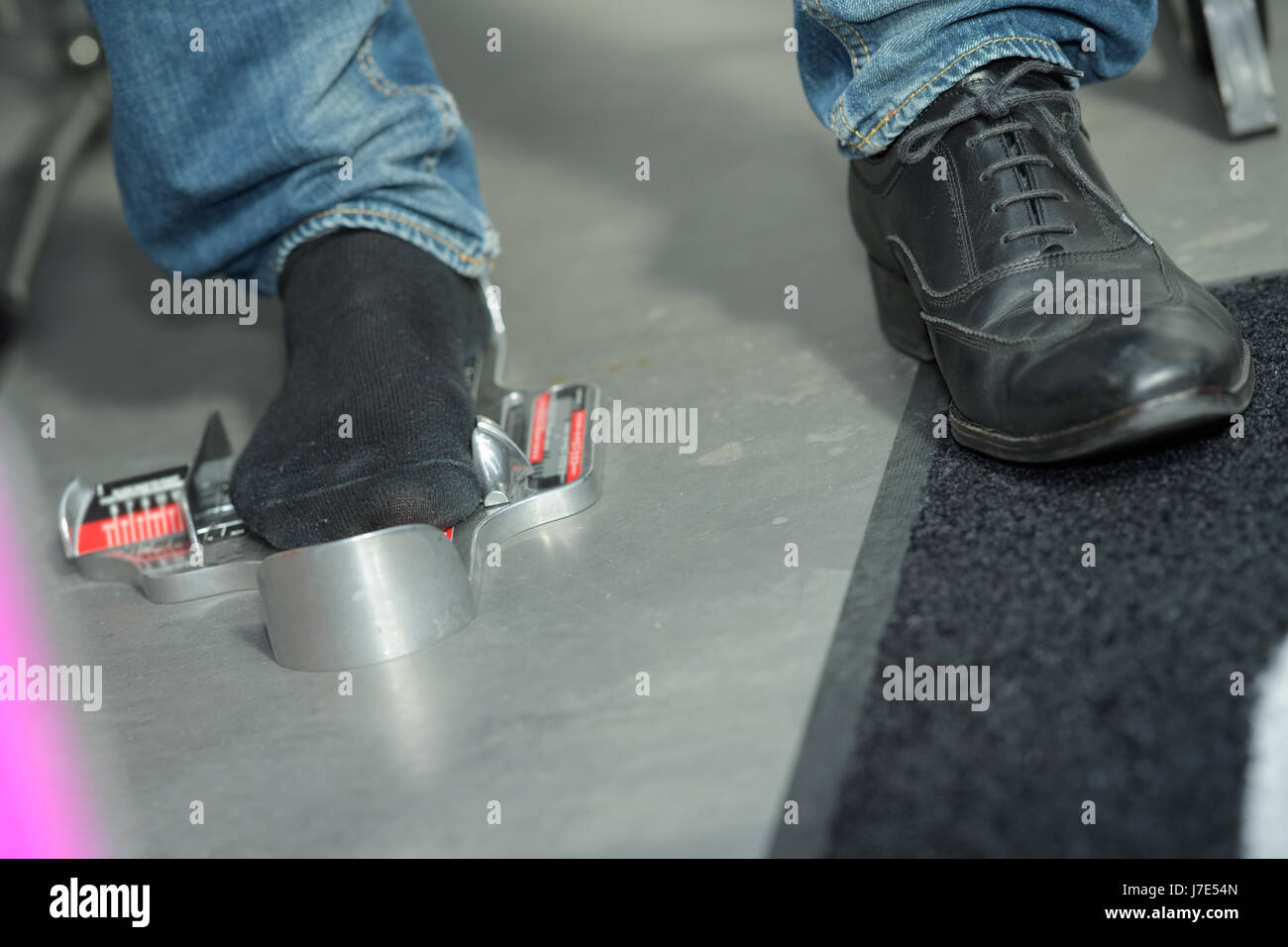 checking shoe size Stock Photo - Alamy
