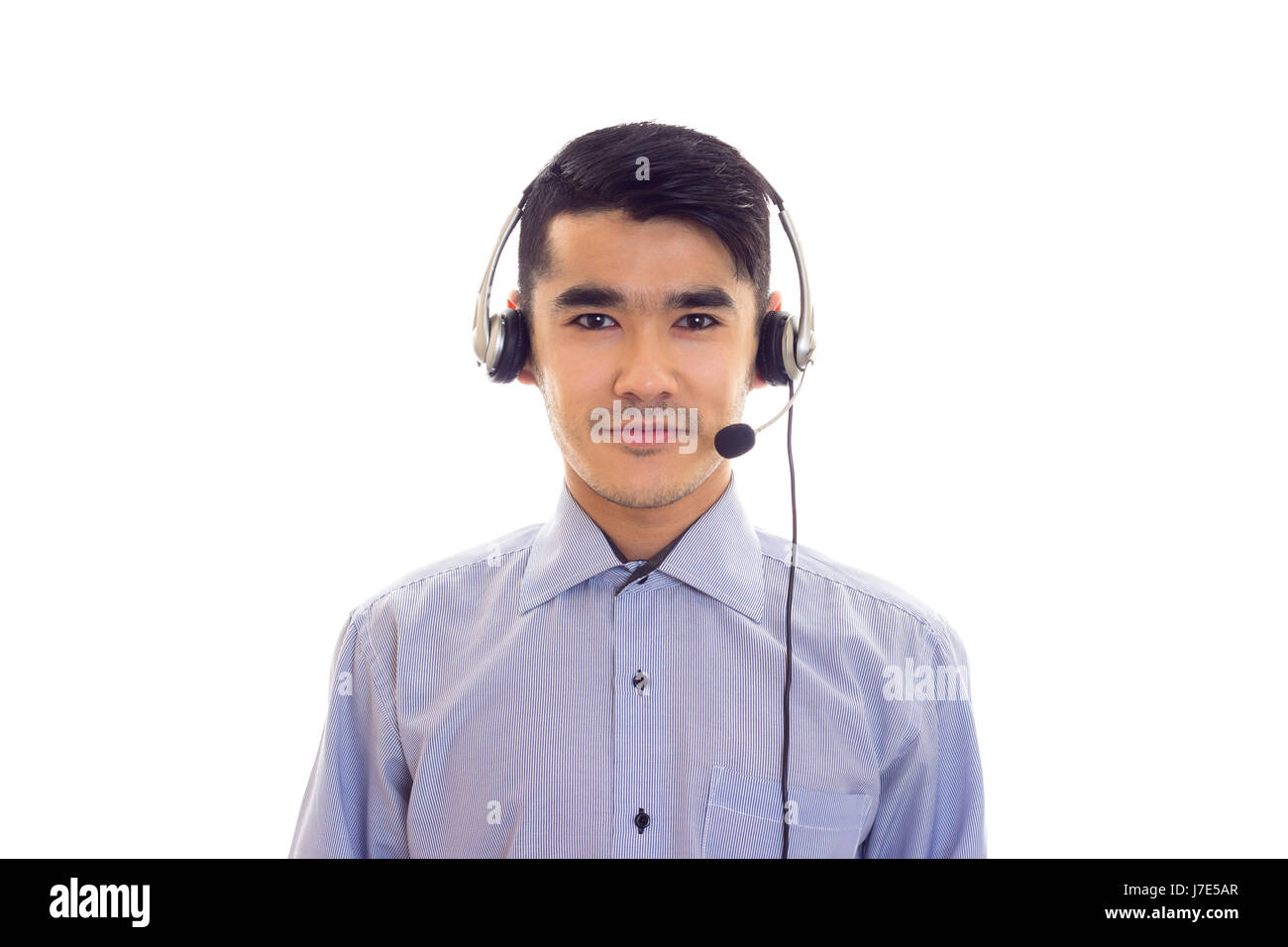 Young man using headphones Stock Photo - Alamy