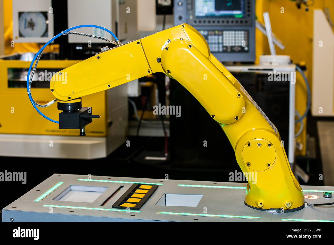 Fully automated CNC machining with handling robot Stock Photo - Alamy