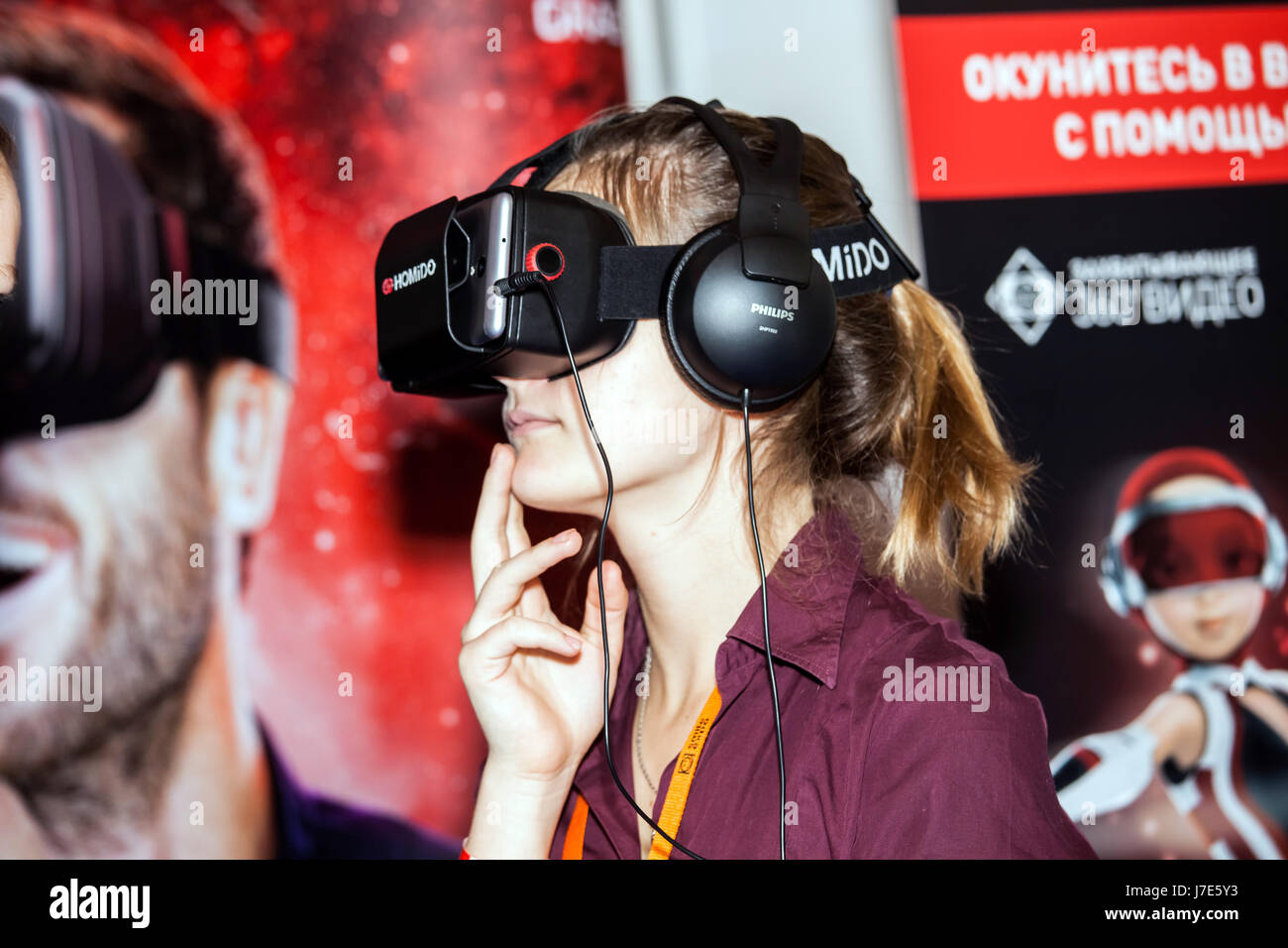 Moscow, Russia - November, 2016: Girl playing with Homido virtual ...