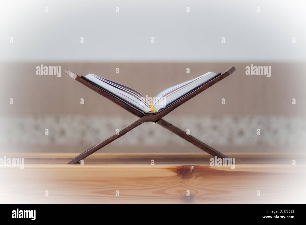 Quran-holy book of Muslims, an open book on a stand with rosary Stock ...