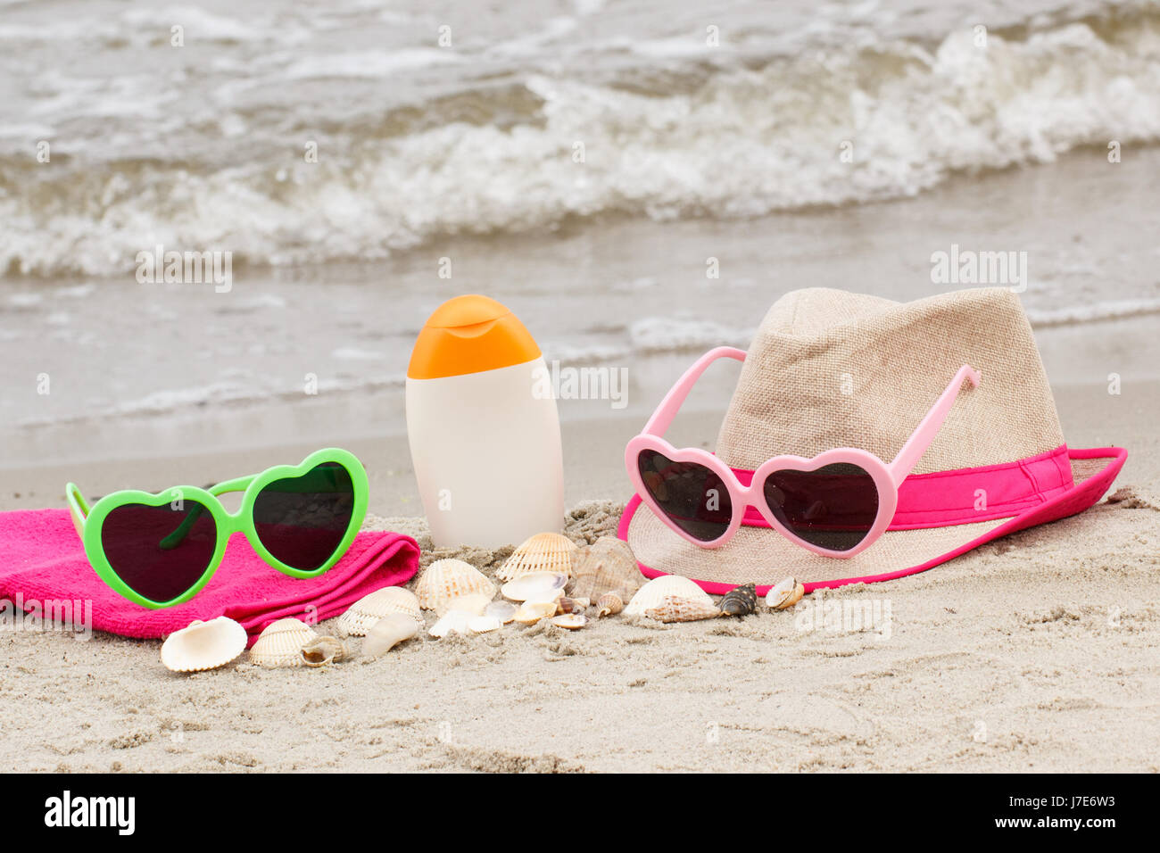 Seashells and accessories for vacation on sand at beach, concept of sun ...