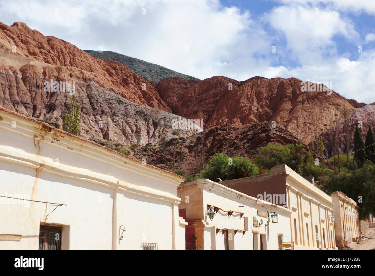 Road in Purmamarca, colonial buildings, Quebrada de Humahuaca ...