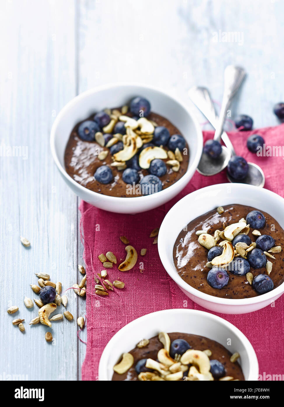 Blueberry smoothie bowl with plums Stock Photo - Alamy