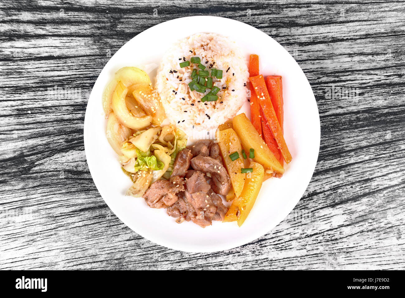 Thai jasmine rice in American Korean style, Rice with sliced pork steak ...