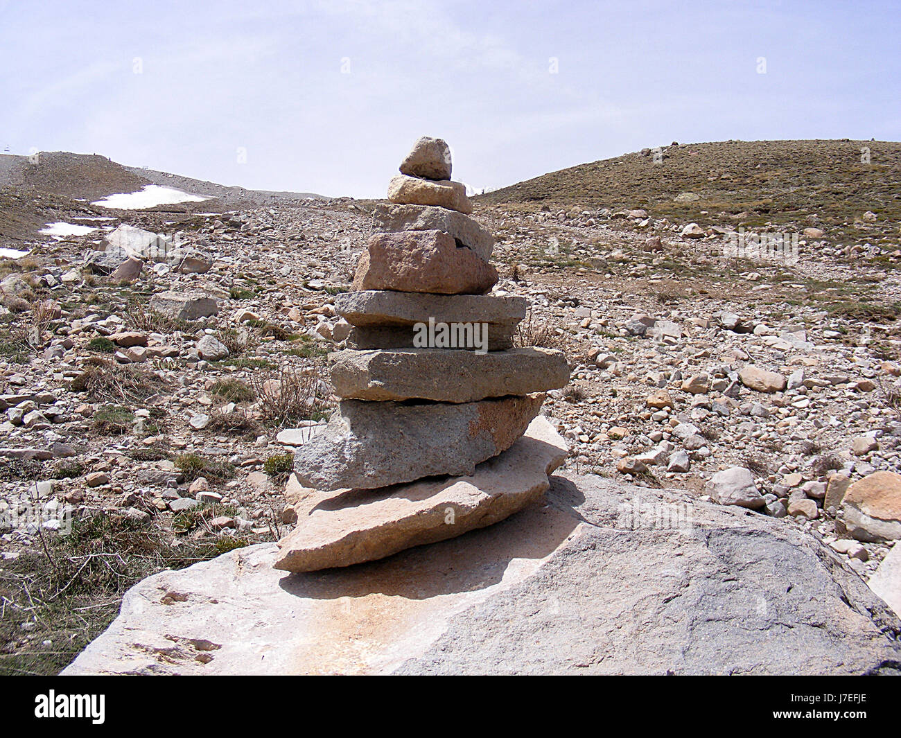 Making signs from the rocks, stacked stone clusters Stock Photo - Alamy