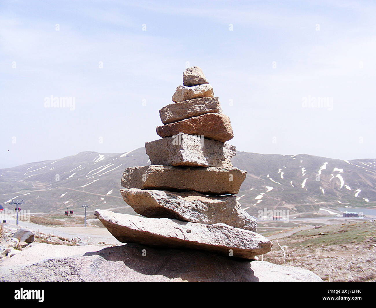 Making signs from the rocks, stacked stone clusters Stock Photo - Alamy