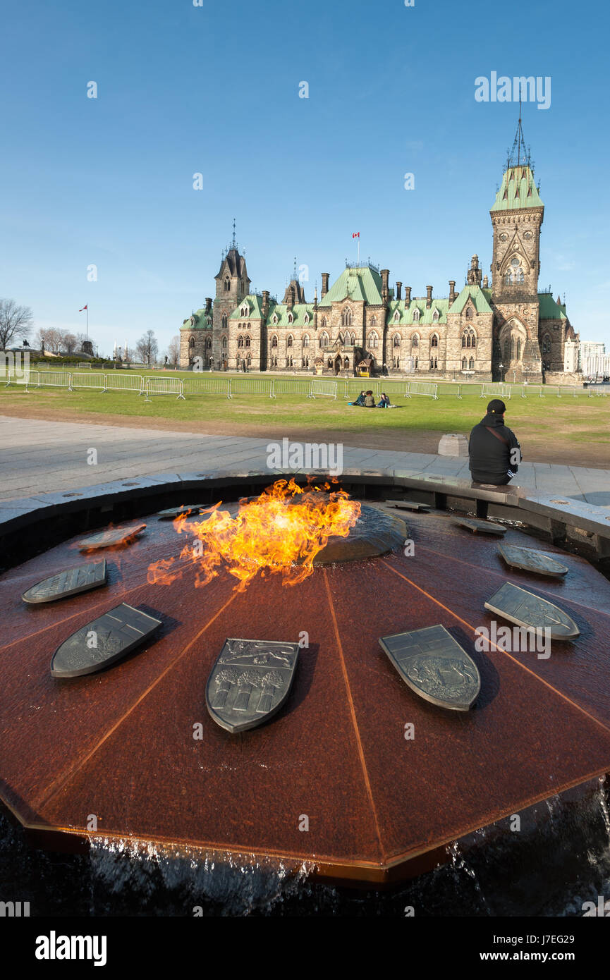 Ottawa partliament buildings and the centennial flame Stock Photo - Alamy