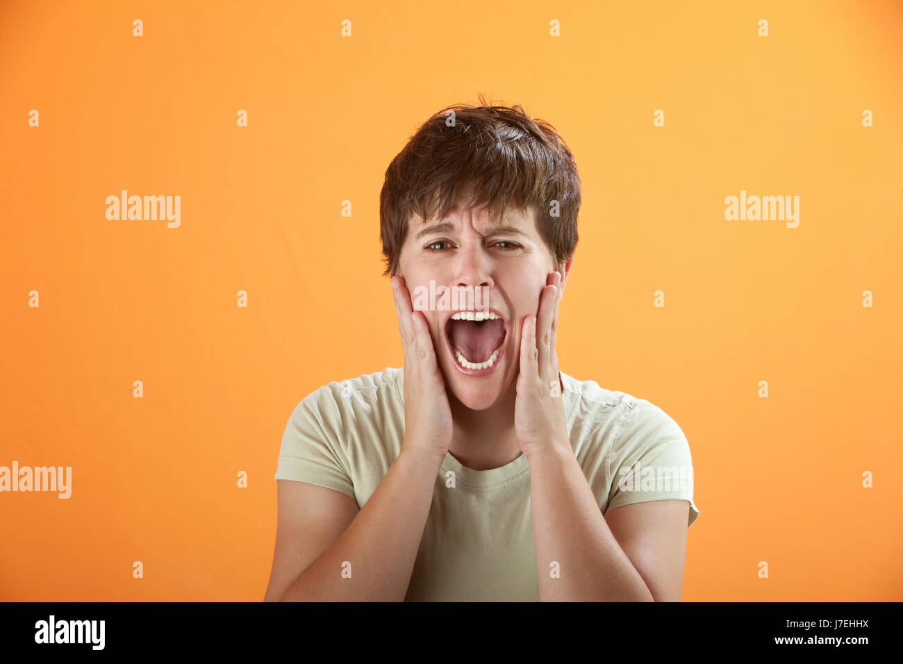 brown brownish brunette expression anxious afraid emotion backdrop ...