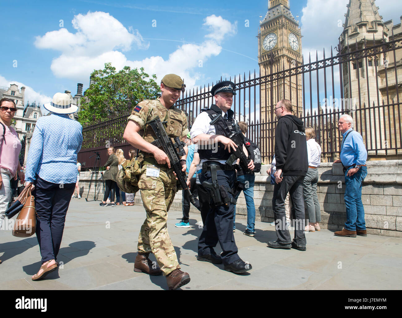 London, United Kingdom. 24th May 2017. Armed police and soldiers patrol ...