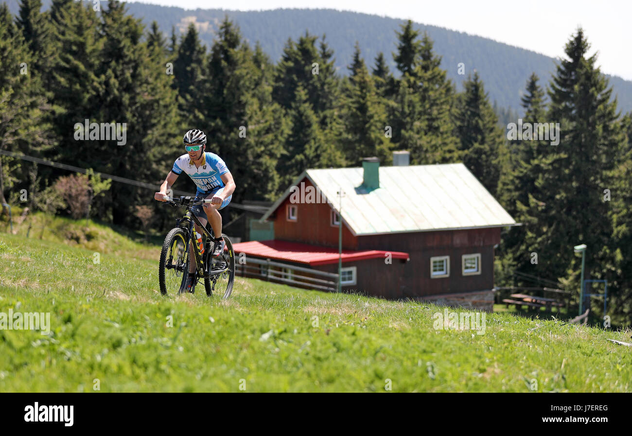 Trail keeper Toni Escher cycles along the Stoneman Miriquidi near Bozi ...