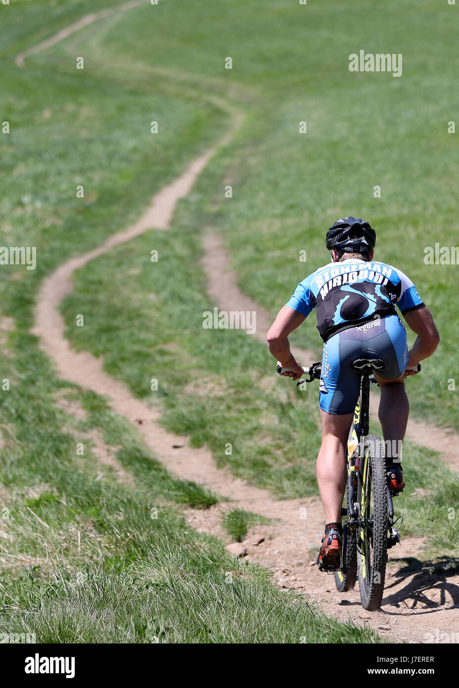 Trail keeper Toni Escher cycles along the Stoneman Miriquidi near Bozi ...