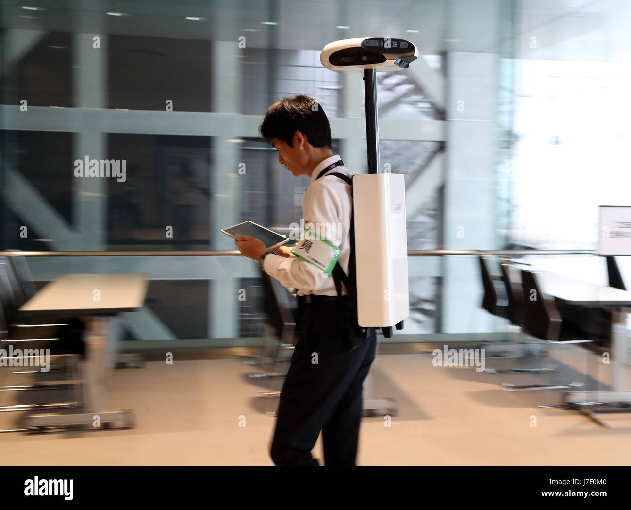 Tokyo, Japan. 24th May, 2017. A researcher of Japan's Mitsubishi ...